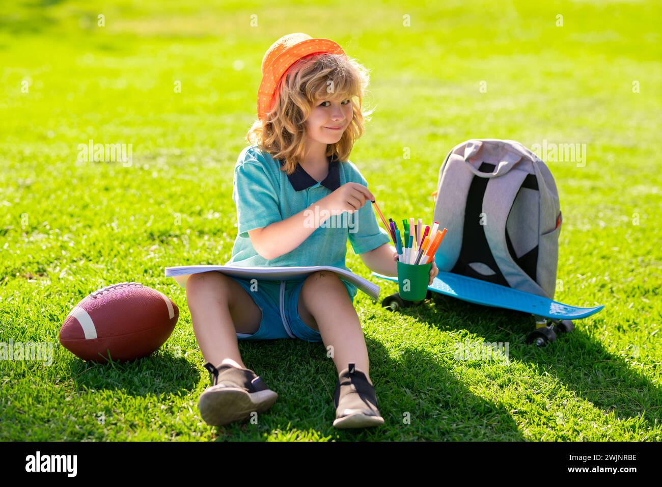 Outdoor kid play and draw craft artwork homework. Child drawing picture ...