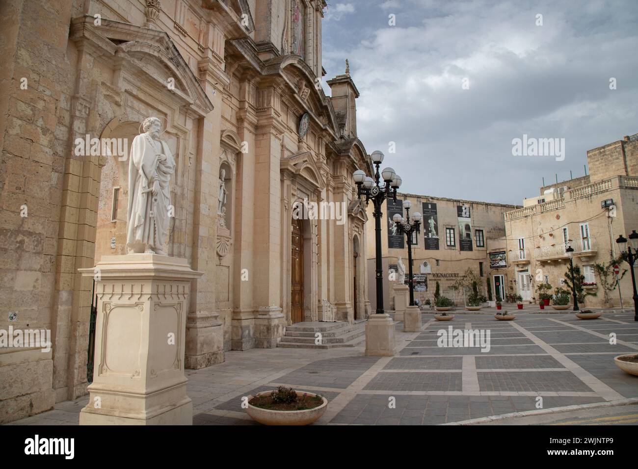 A grand architectural structure featuring a central statue Stock Photo ...