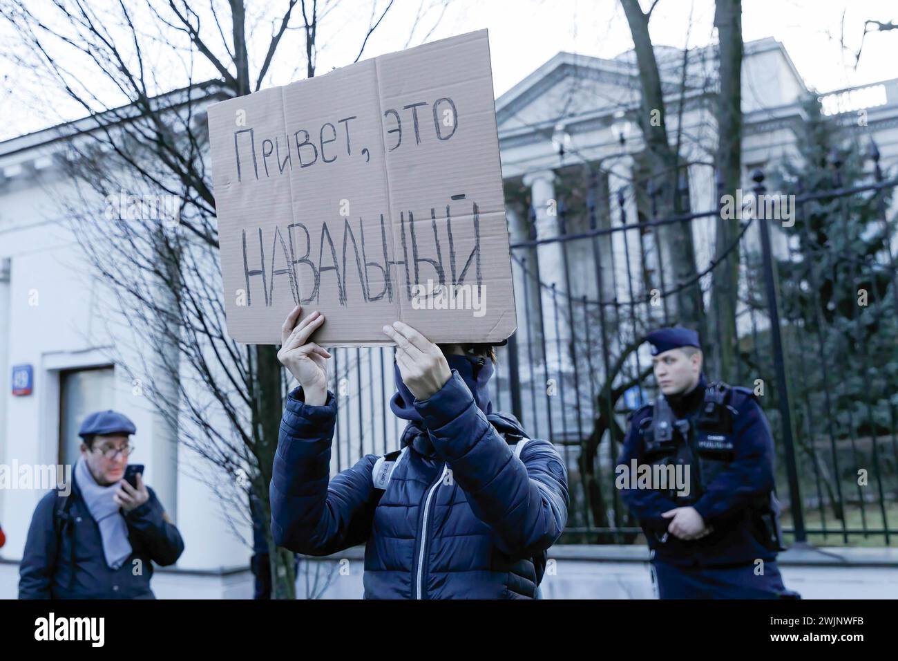 A woman holds a placard during a rally near the building of the Russian ...