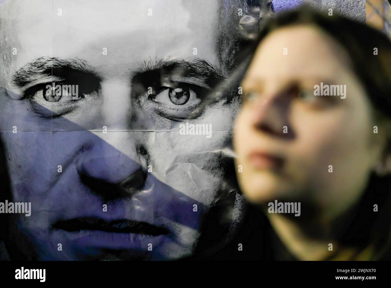 A poster with the portrait of Alexei Navalny is seen in front of the ...