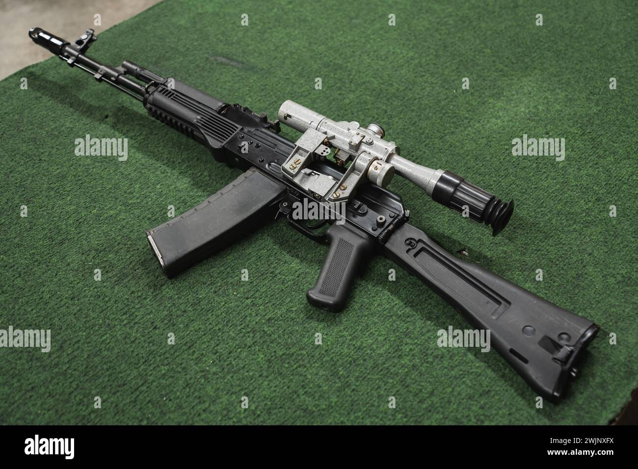 AK74m assault rifle with an optical sight at a shooting range. High ...