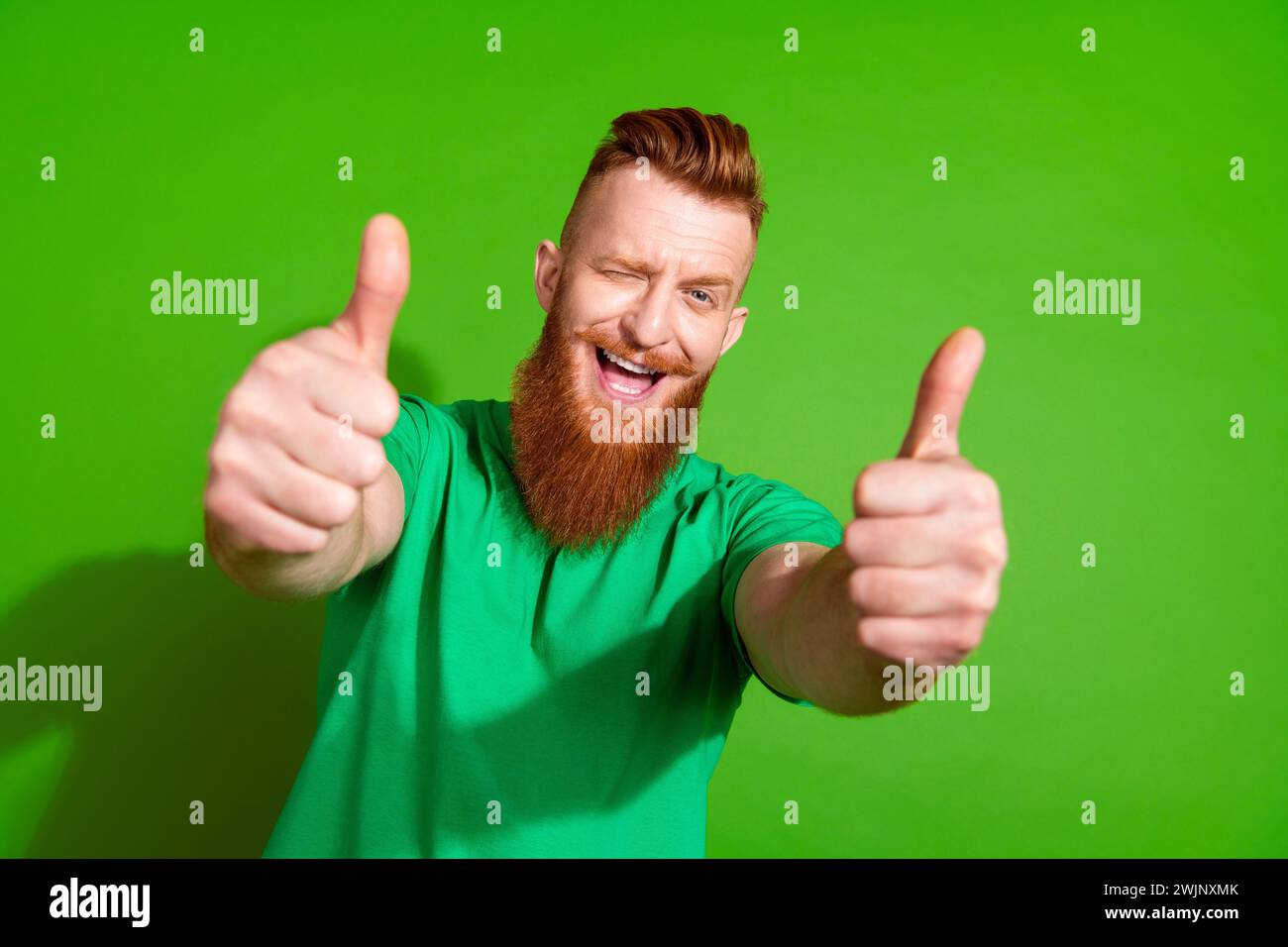 Photo of satisfied man with ginger long beard dressed stylish t-shirt ...