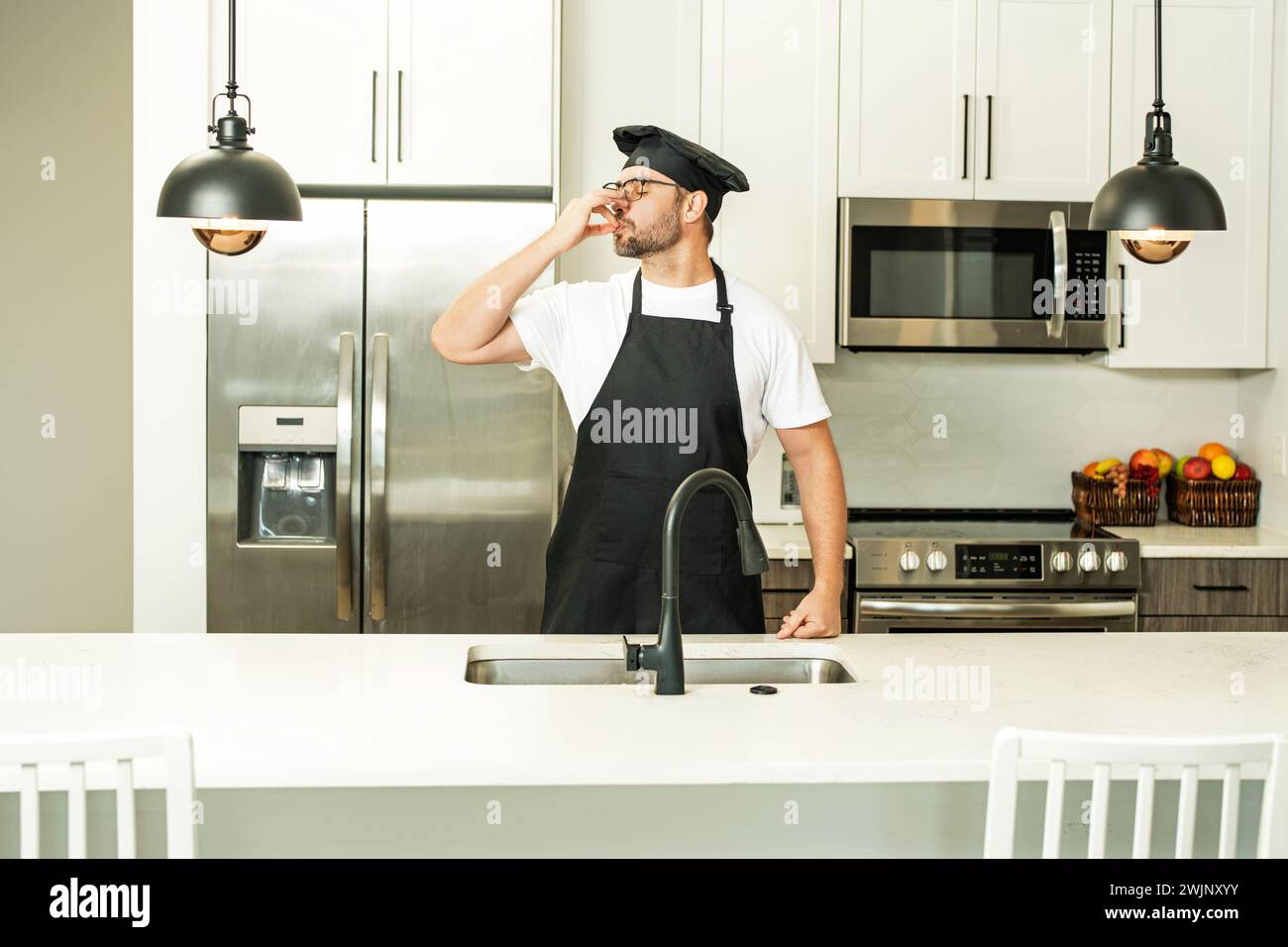 Portrait of chef cooker in kitchen. Chef with sign of perfect food ...