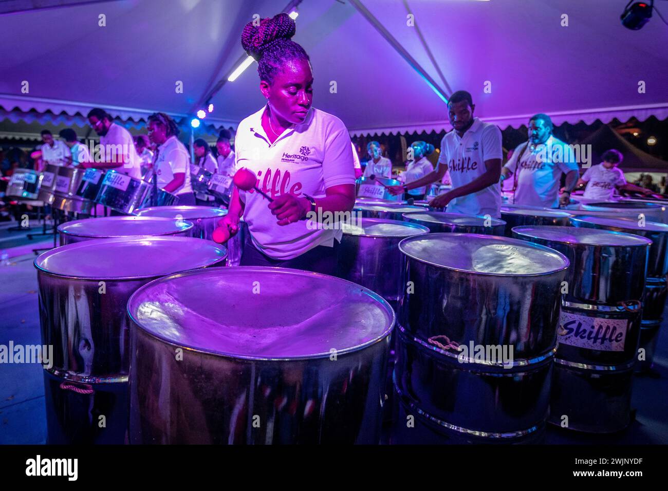 People playing a Steel Pan in World Pan Day celebration in Trinidad and ...