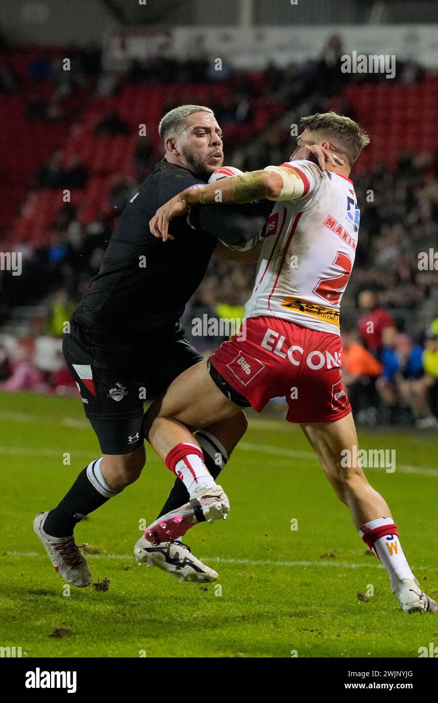 Hakim Miloudi of London Broncos runs into Tommy Makinson of St. Helens ...