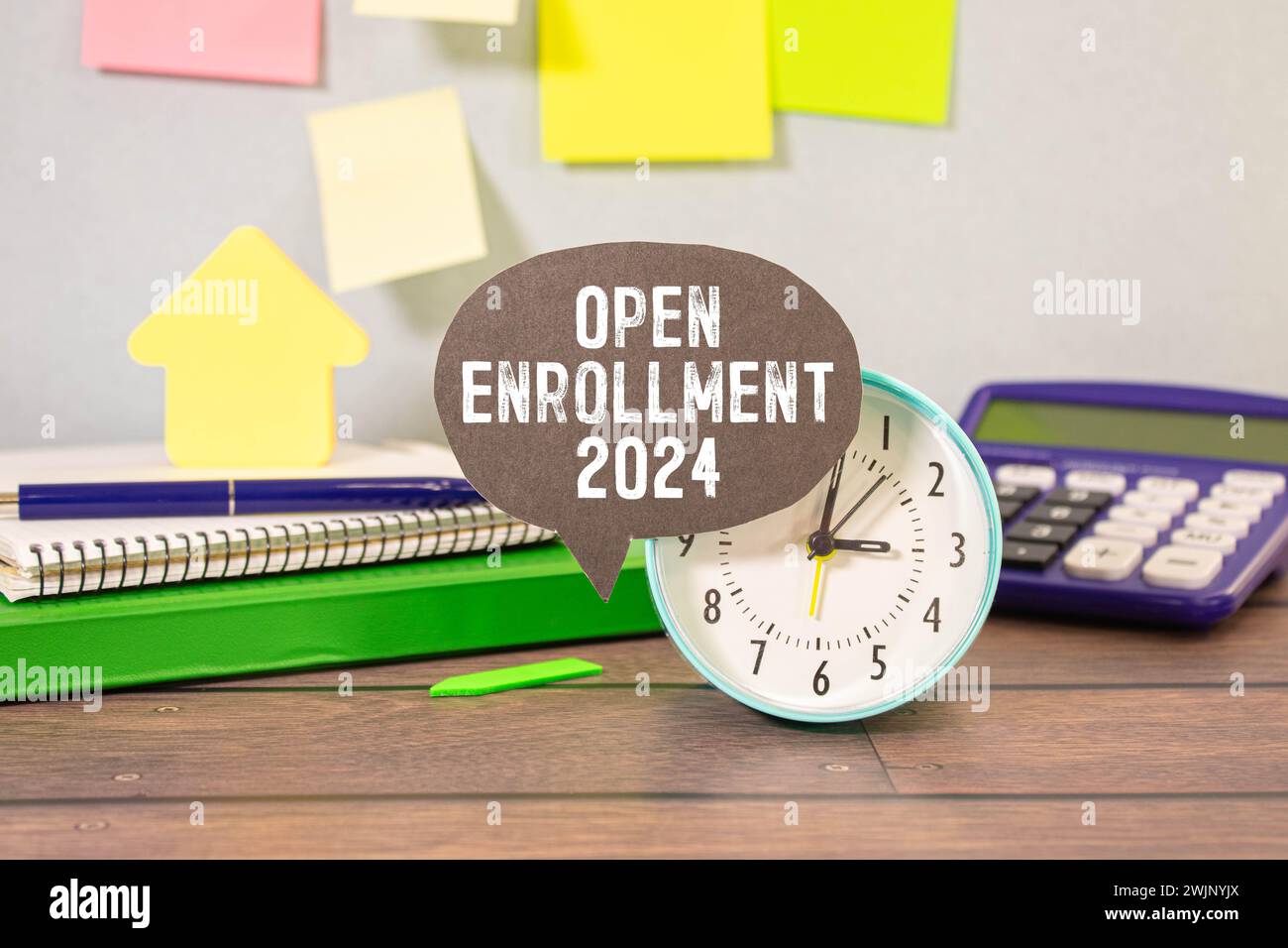 open enrollment 2024. text on a sticker next to money and banknotes ...