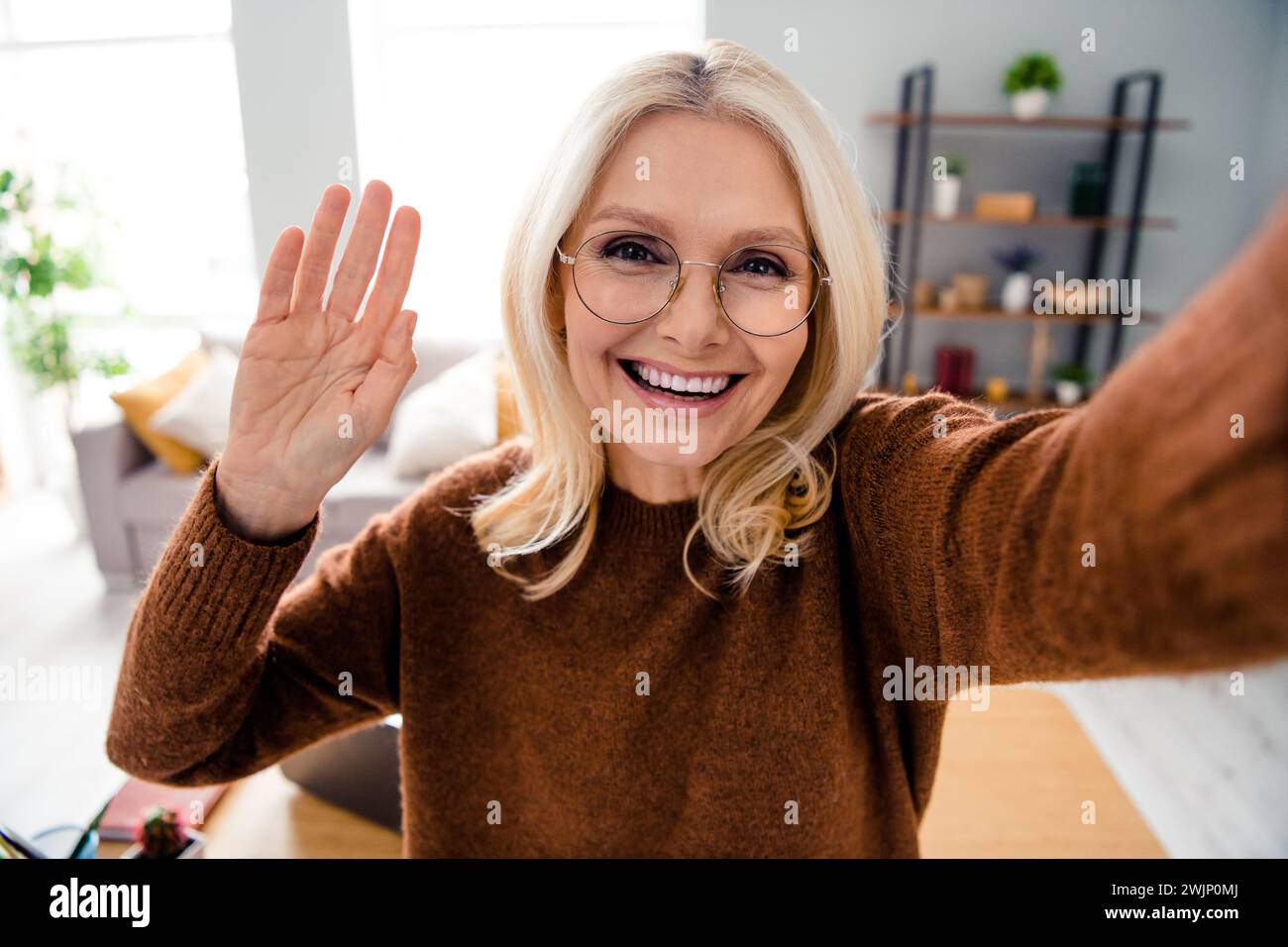 Selfie photo of pensioner cheerful business woman wear glasses in brown ...