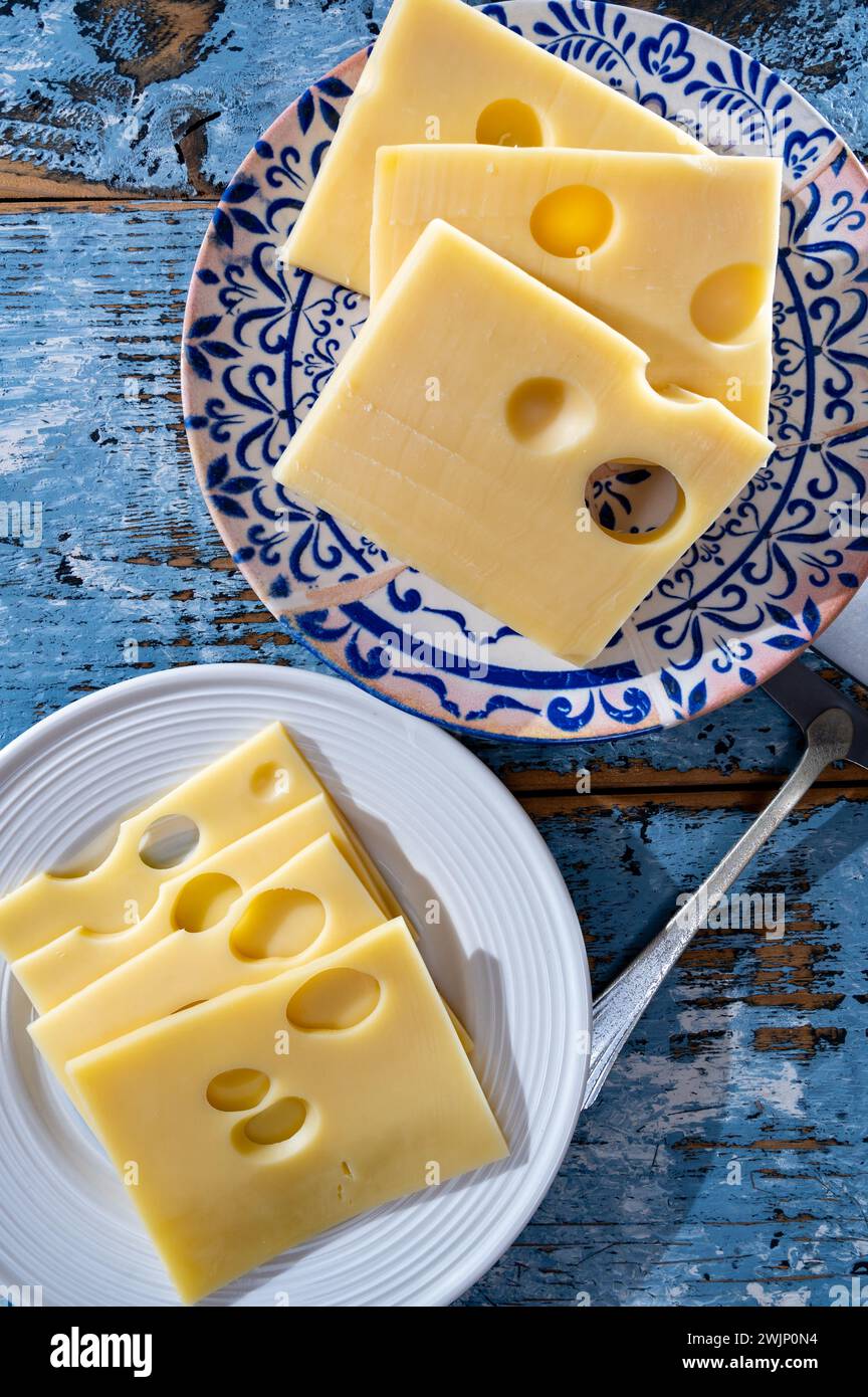 Swiss cheese collection, yellow emmentaler or emmental cheese with ...