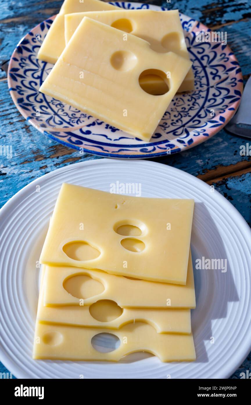 Swiss cheese collection, yellow emmentaler or emmental cheese with ...