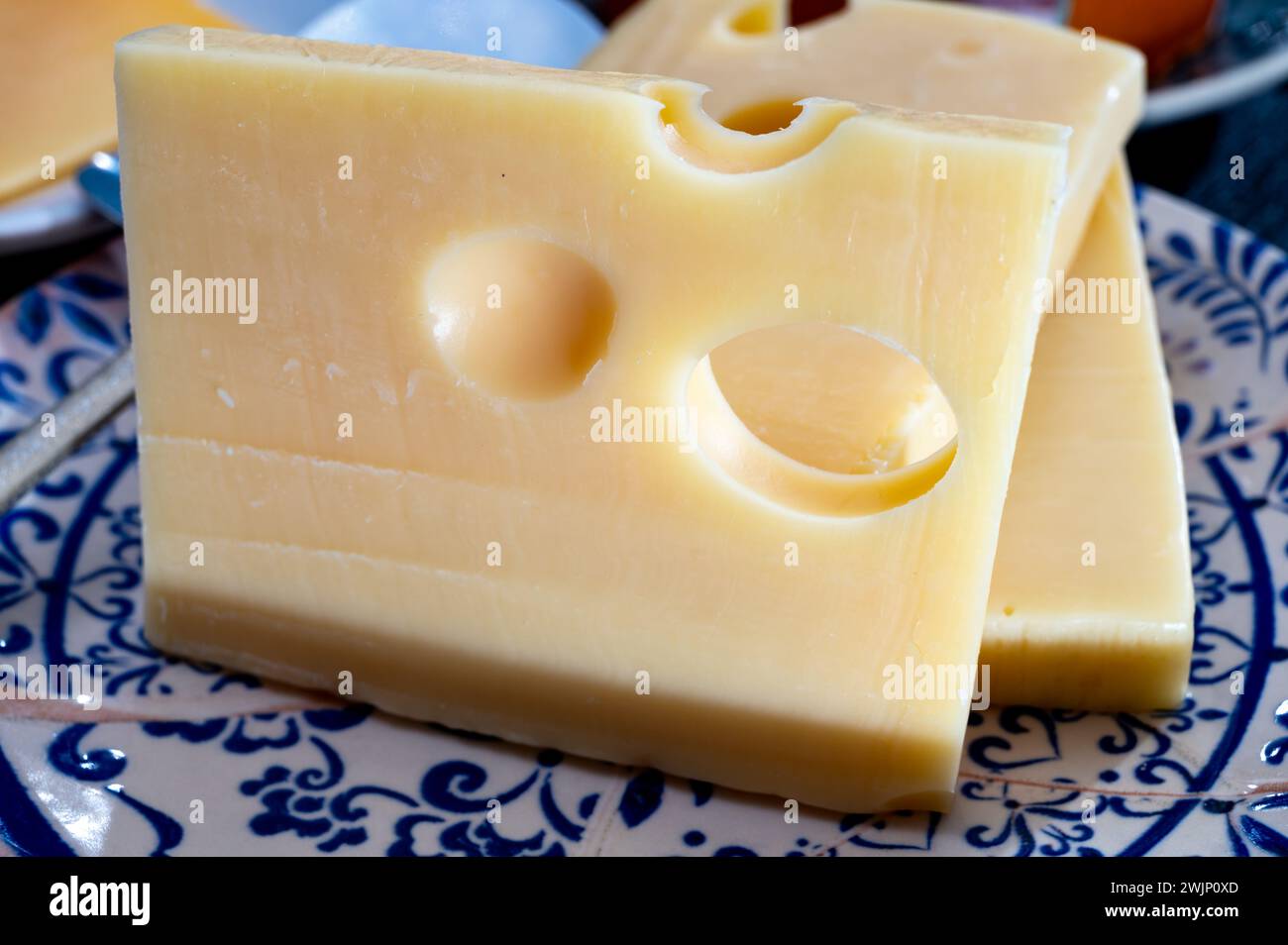 Swiss cheese collection, yellow emmentaler or emmental cheese with ...