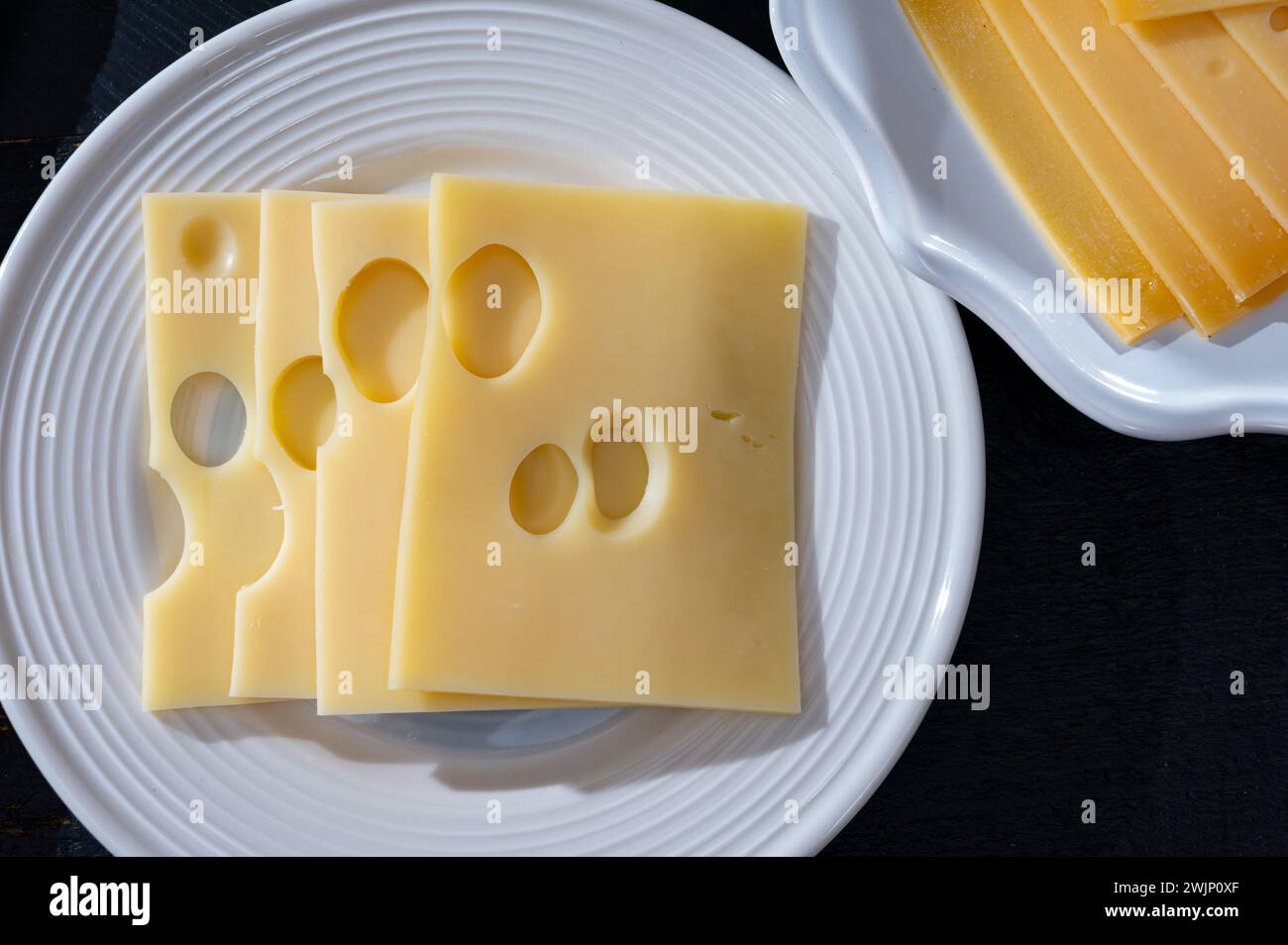 Swiss cheese collection, yellow emmentaler or emmental cheese with ...