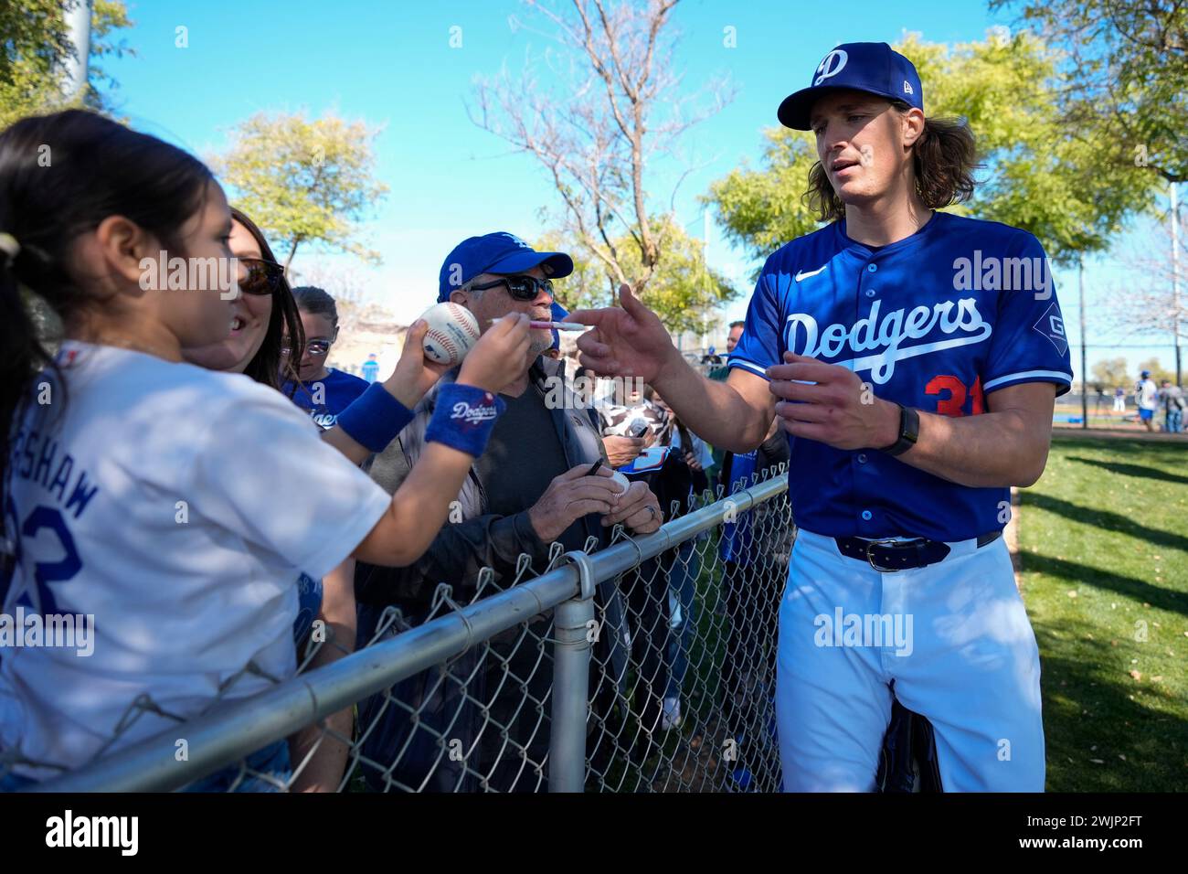 Los Angeles Dodgers starting pitcher Tyler Glasnow signs autographs for ...
