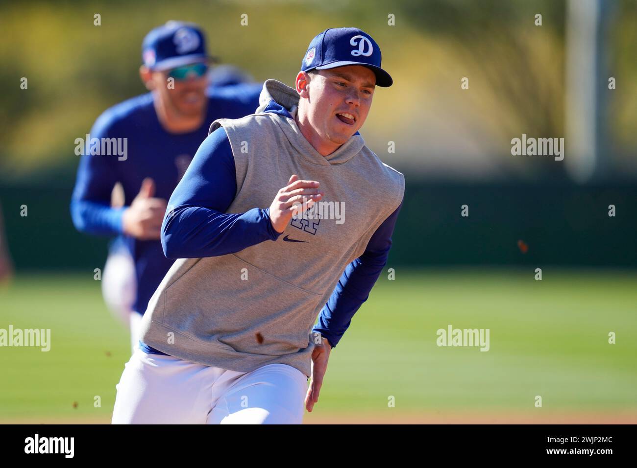 Los Angeles Dodgers catcher Will Smith, right, participates in spring ...