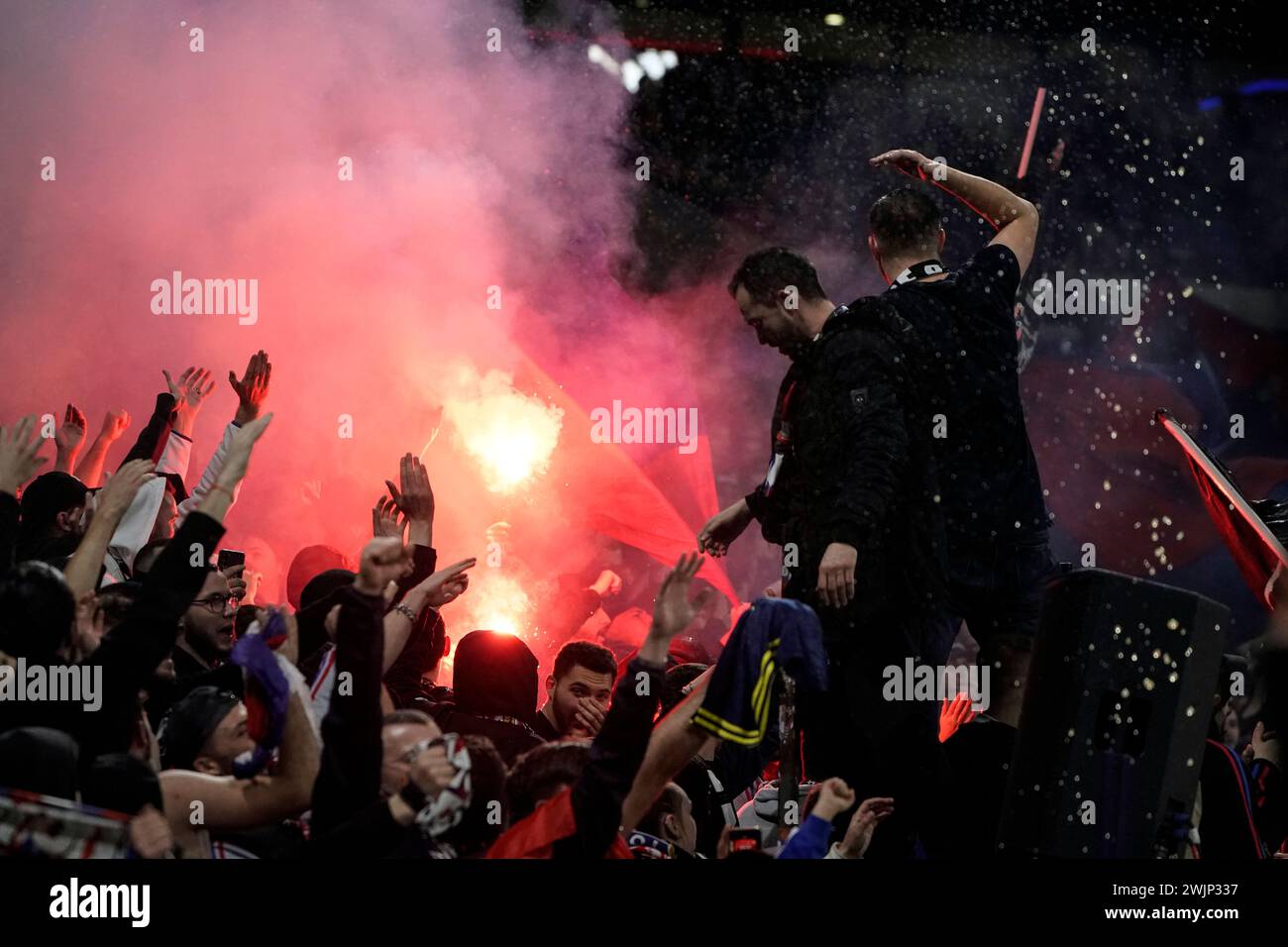Lyon supporters sing during the French League One soccer match between ...