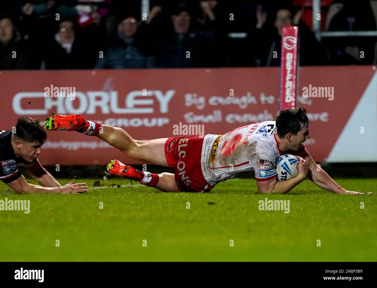 St Helens' Matt Whitley scores their side's sixth try of the game ...