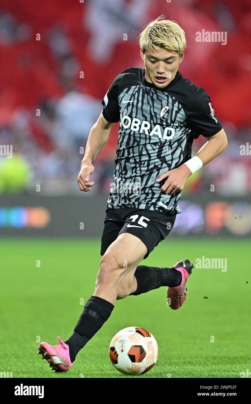 Lens, France. 15th Feb, 2024. Ritsu Doan (42) of Freiburg pictured ...