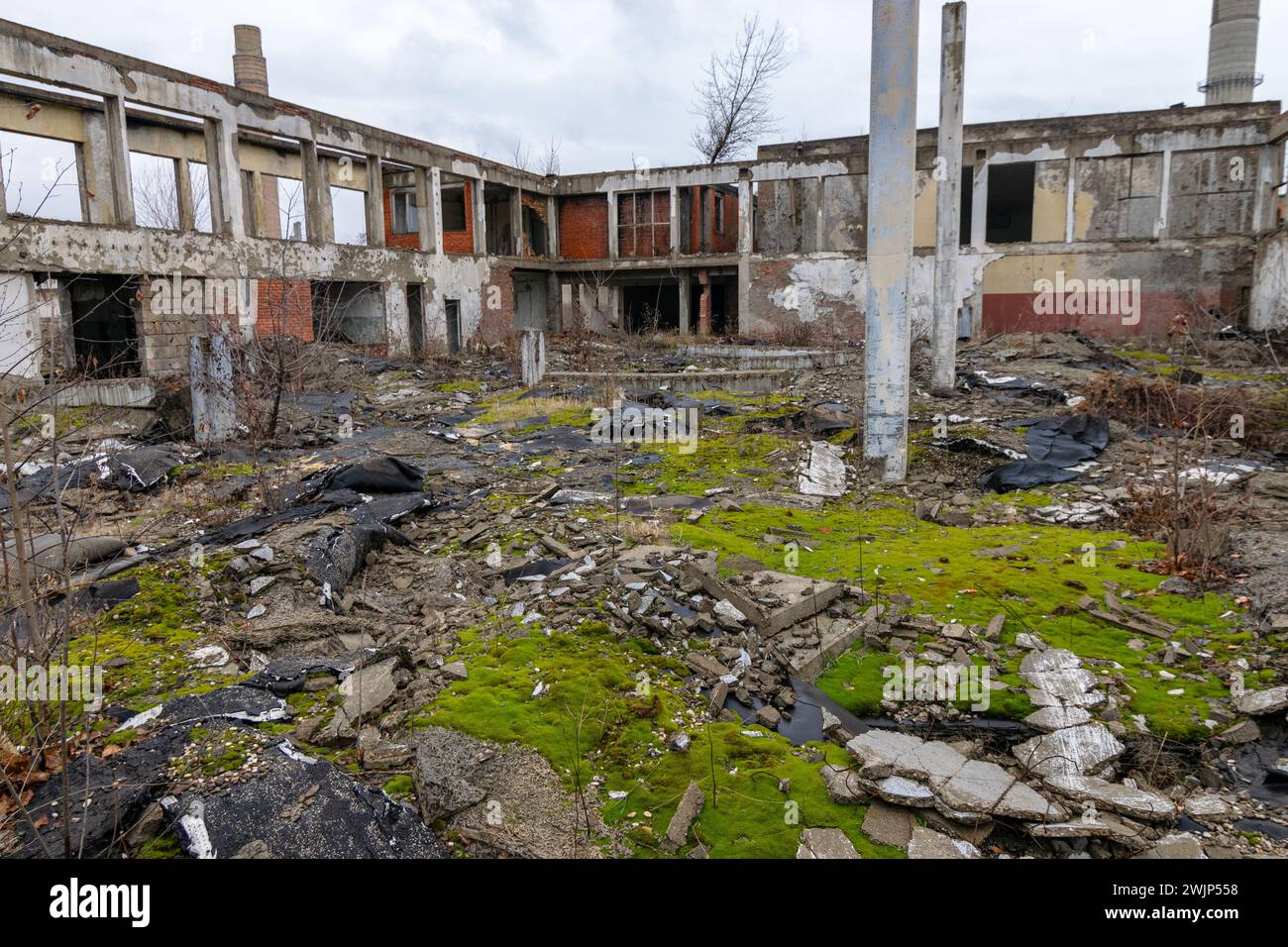 Halls of an old chemical factory looted dilapidated crumbling bricks ...