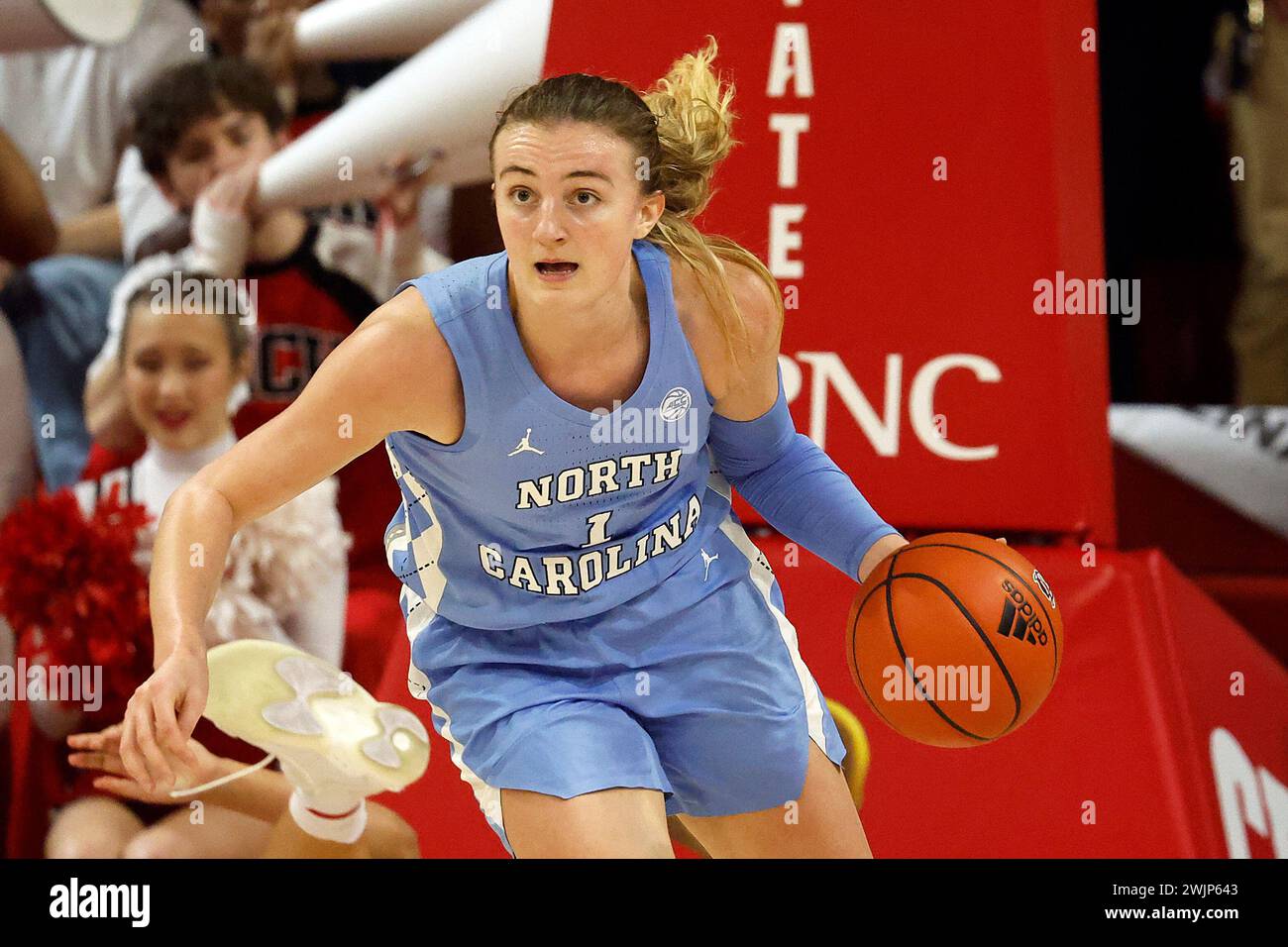 North Carolina's Alyssa Ustby (1) moves the ball against North Carolina ...