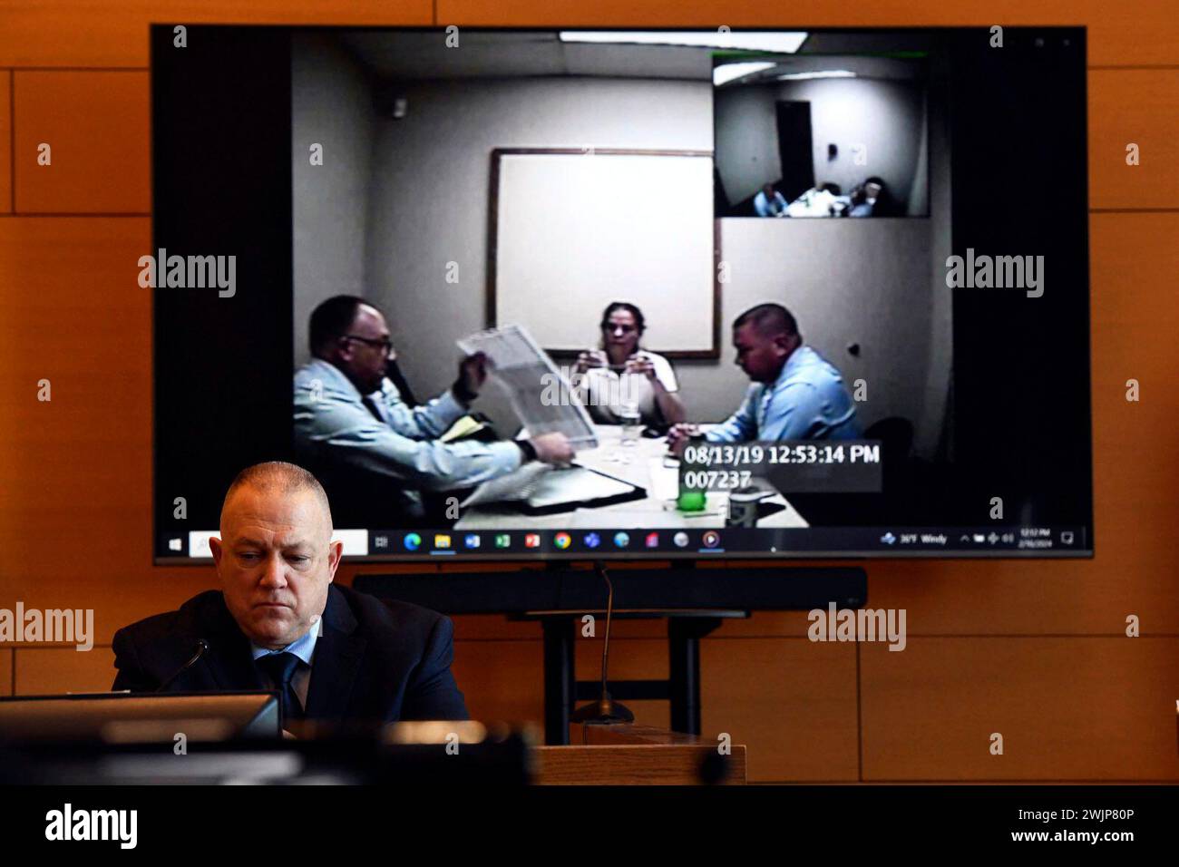 Former Connecticut State Police Detective John Kimball watches video of ...