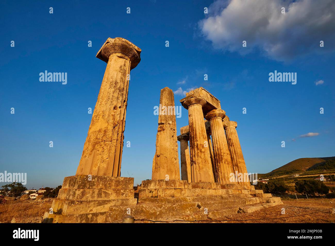 Archaic Temple of Apollo, Doric Columns, Columns of an ancient temple in the light of the sunset ...