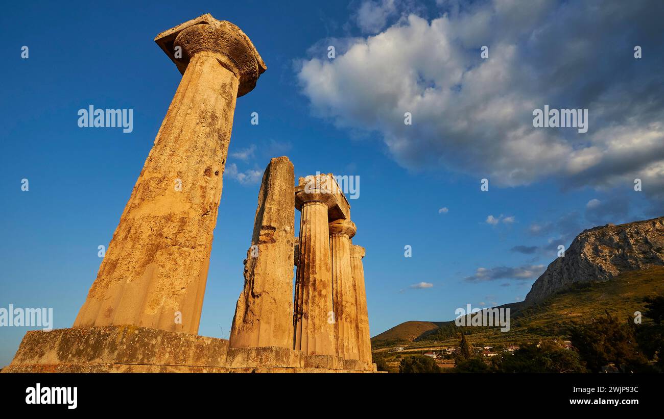 Archaic Temple of Apollo, Doric Columns, Ruins of ancient columns against a vivid blue sky with ...