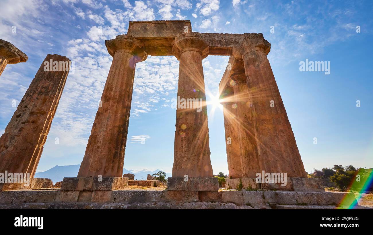 Archaic Temple of Apollo, Doric columns, Rays of light breaking through the columns of a ruined ...