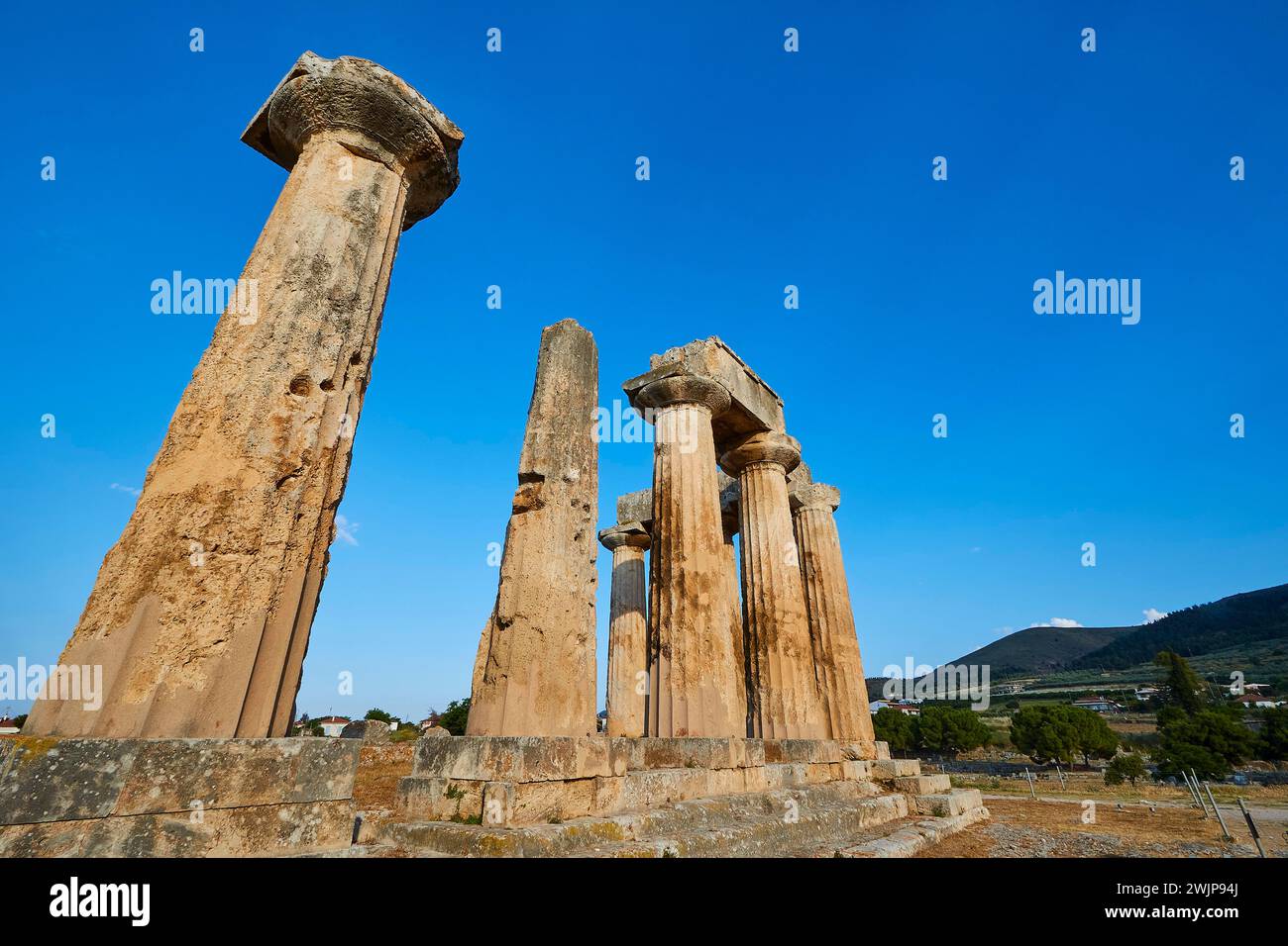 Archaic Temple of Apollo, Doric Columns, Historic columns against a picturesque backdrop of ...