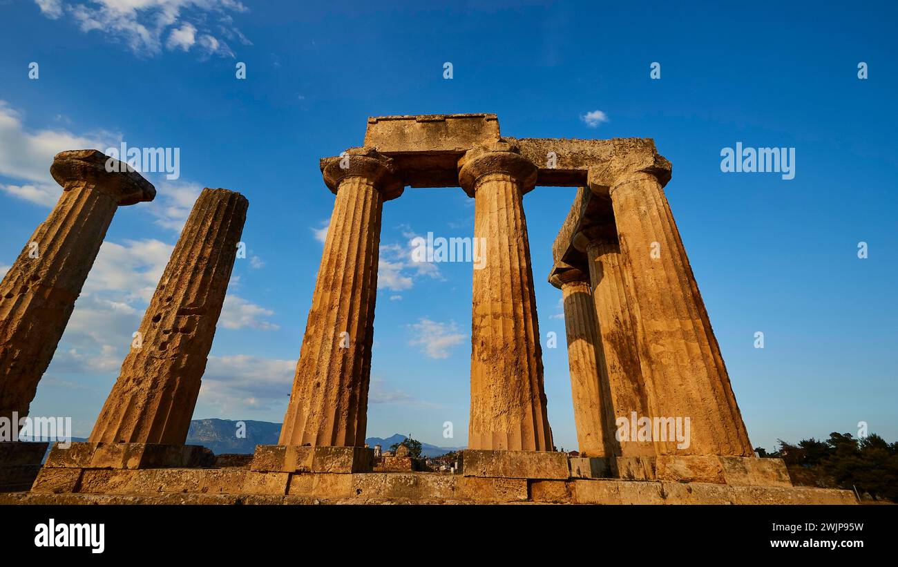 Archaic Temple of Apollo, Doric columns of a temple rise proudly under a bright blue sky ...