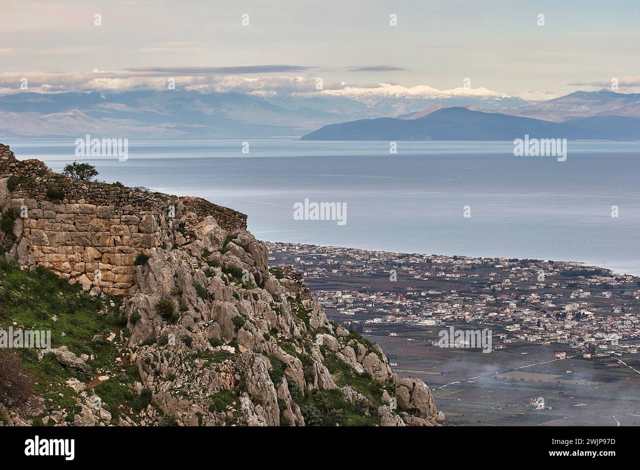 Panoramic view of a coastal town with sea and mountains in the ...