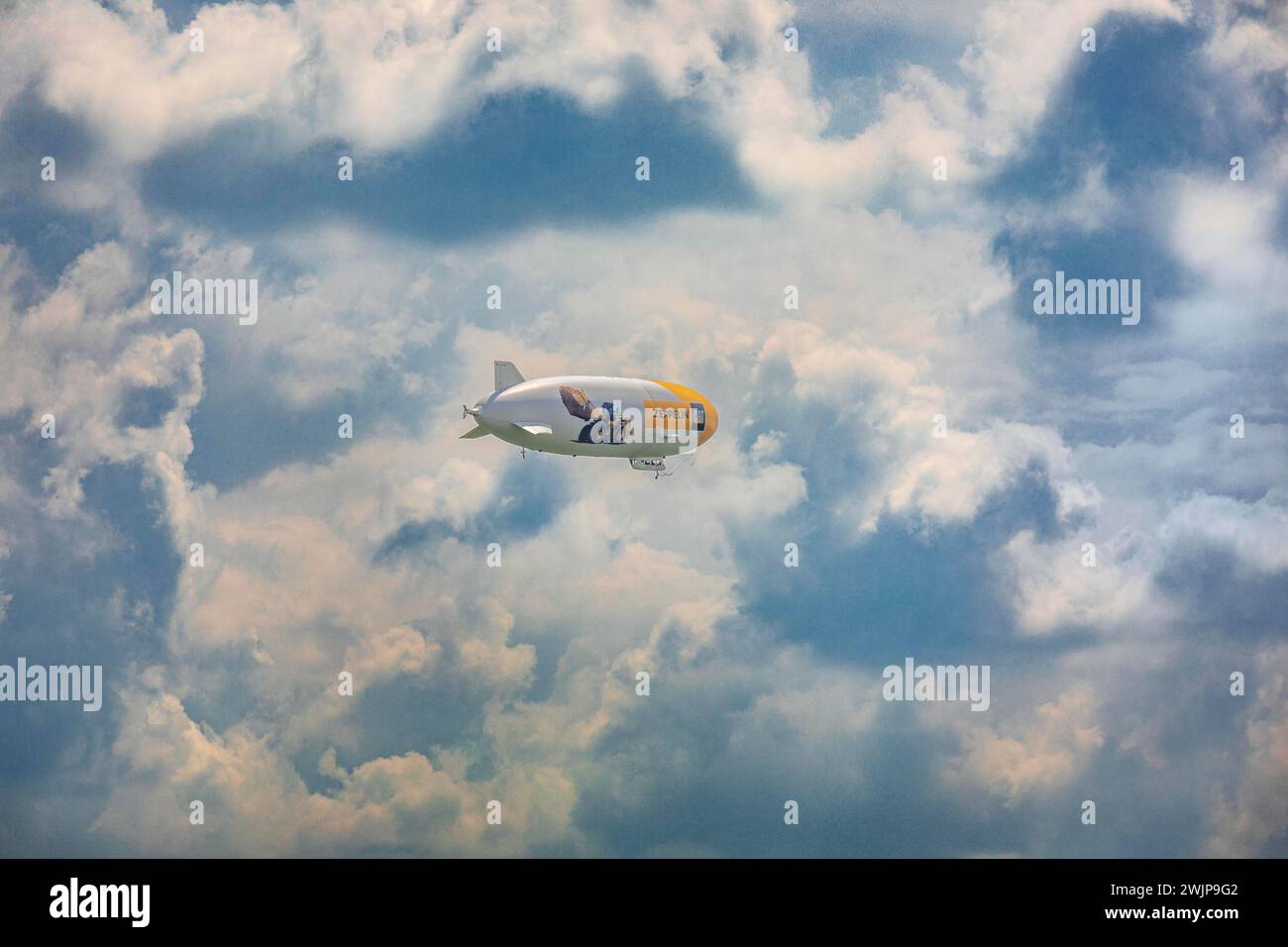 Zeppelin in the cloudy sky, Hartenthal, Unterallgaeu, Bavaria, Germany ...