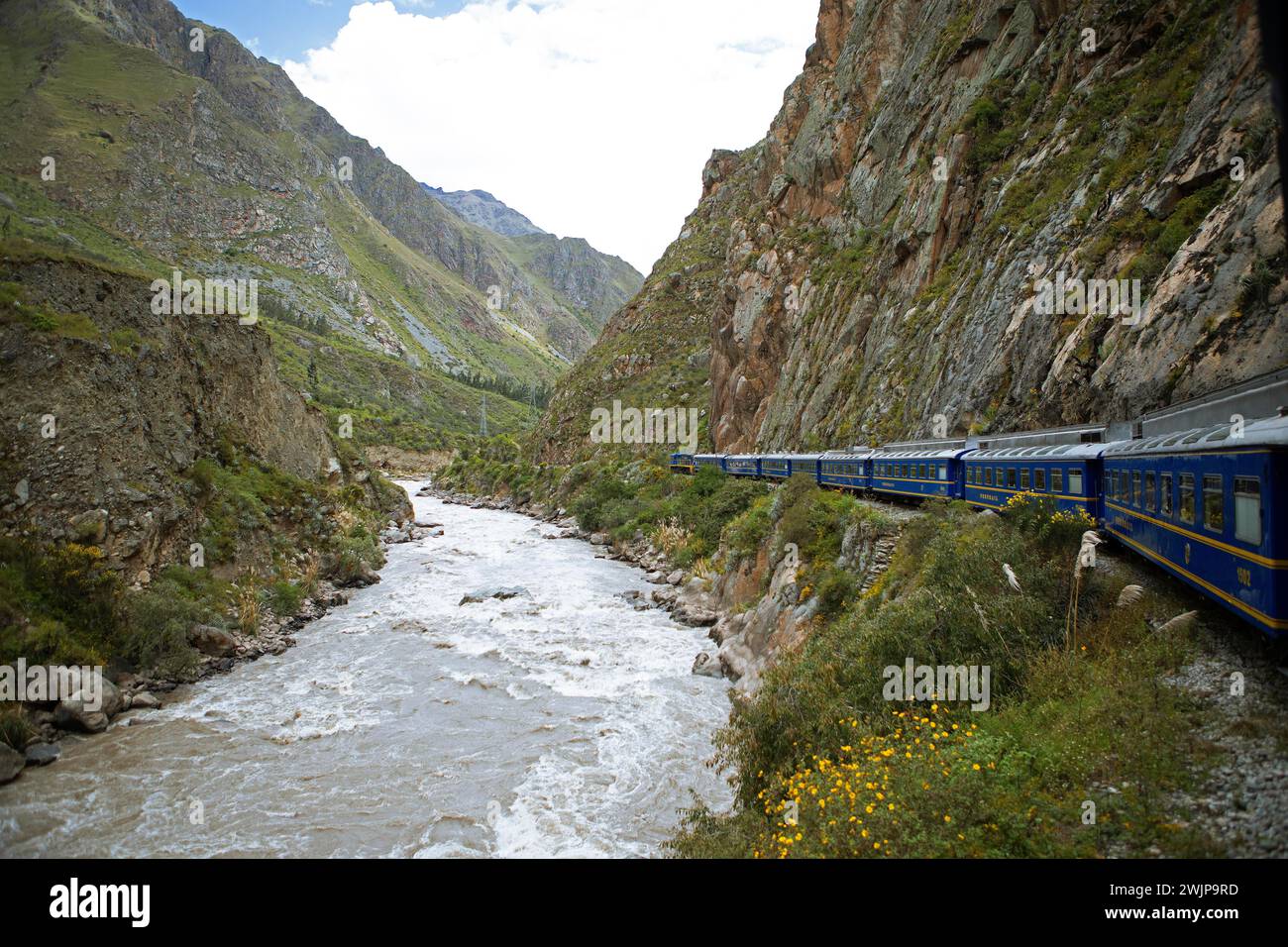 Perurail train travelling through the Andes from Ollantaytambo to Machu ...