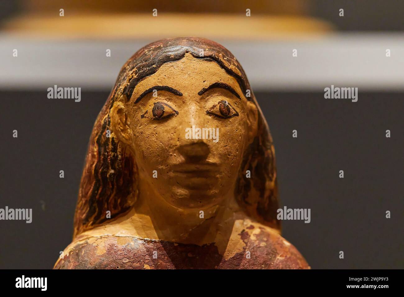 Coloured bust of an ancient person with expressive eyes, Archaeological ...