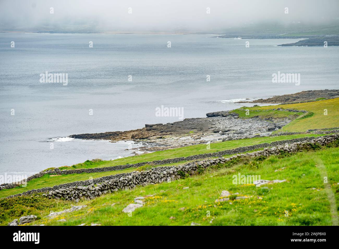 Spectacular misty aerial landscape in the Burren region of County Clare ...