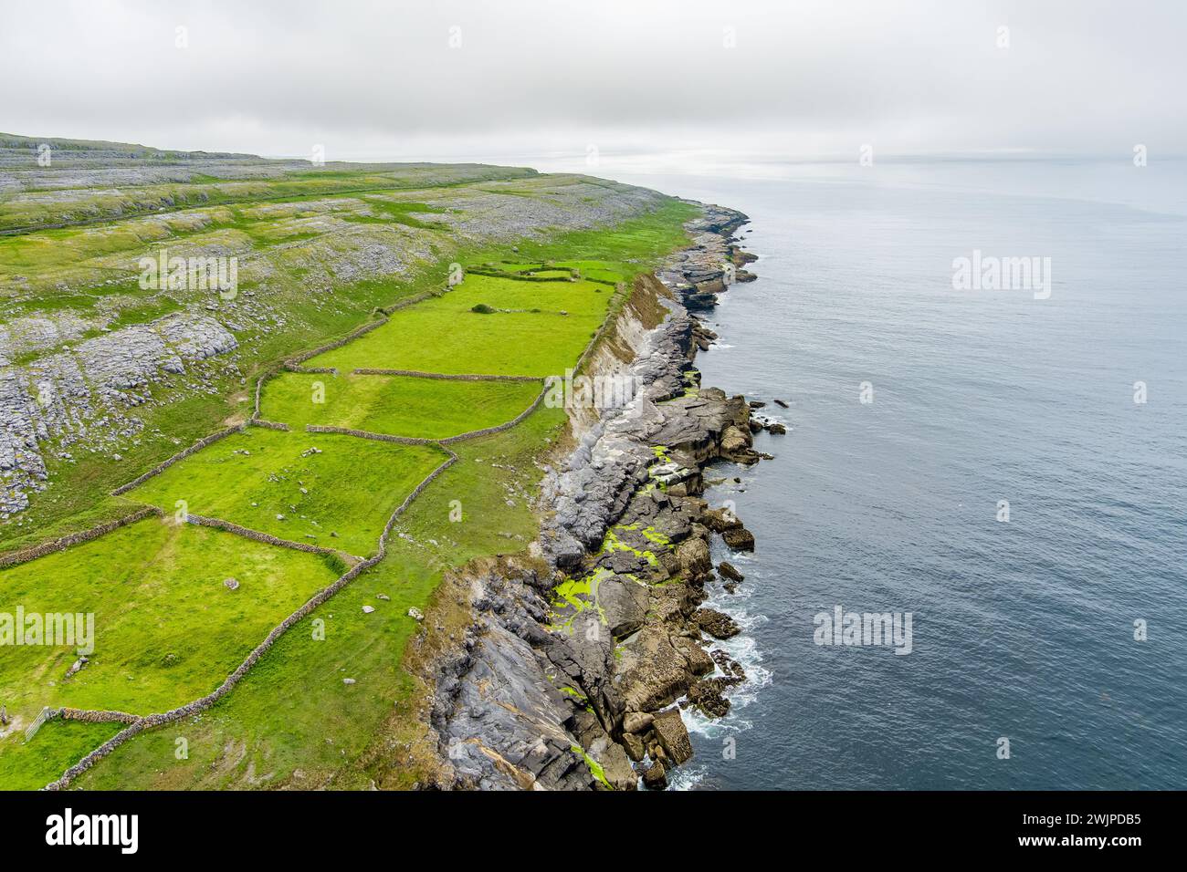 Spectacular misty aerial landscape in the Burren region of County Clare ...
