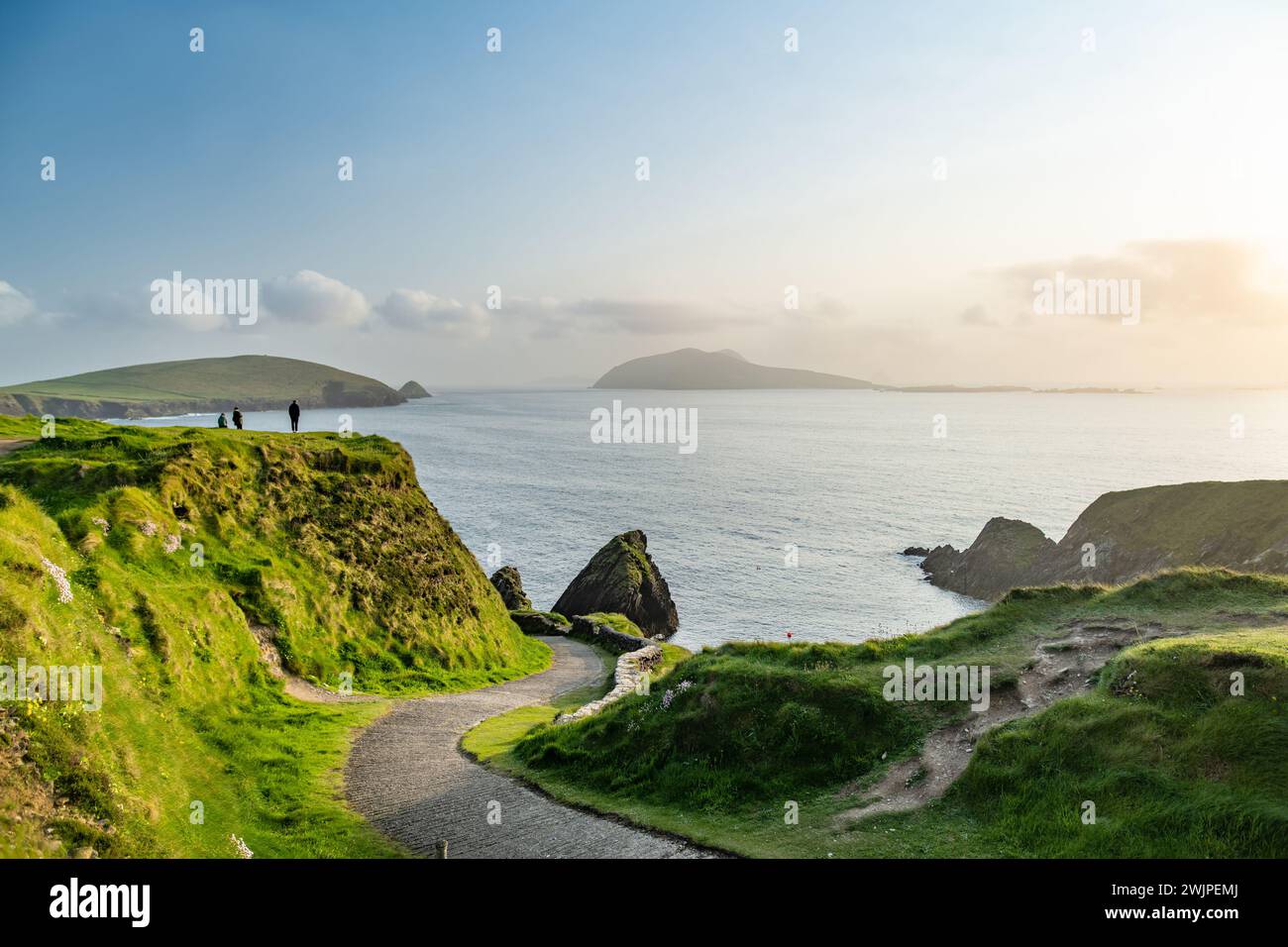 Dunquin or Dun Chaoin pier, Ireland's Sheep Highway. Narrow pathway ...