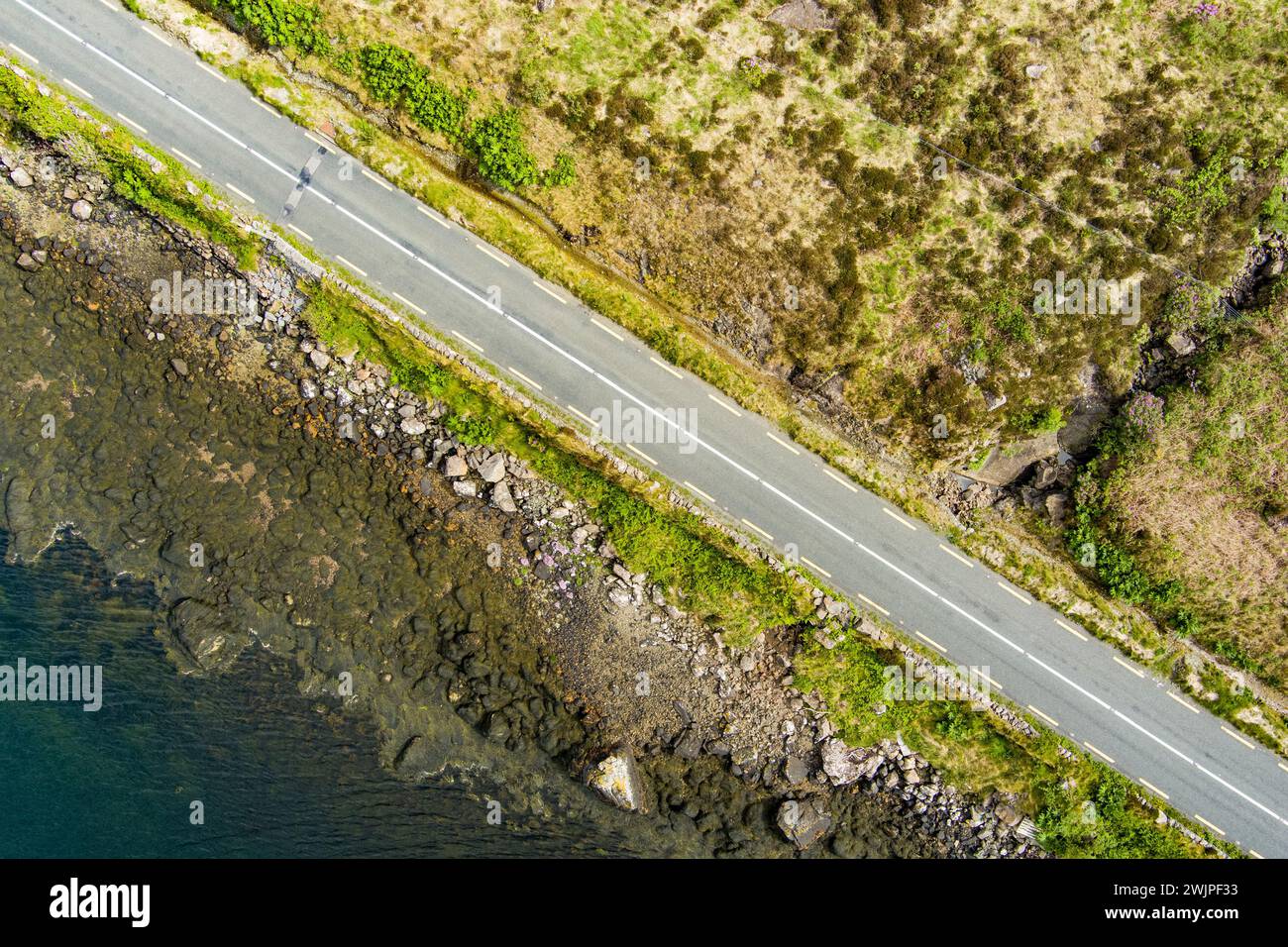 Top down view of a road in Connemara region in Ireland. Scenic Irish ...