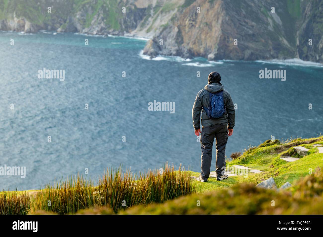 Tourist at Slieve League, Irelands highest sea cliffs, located in south ...