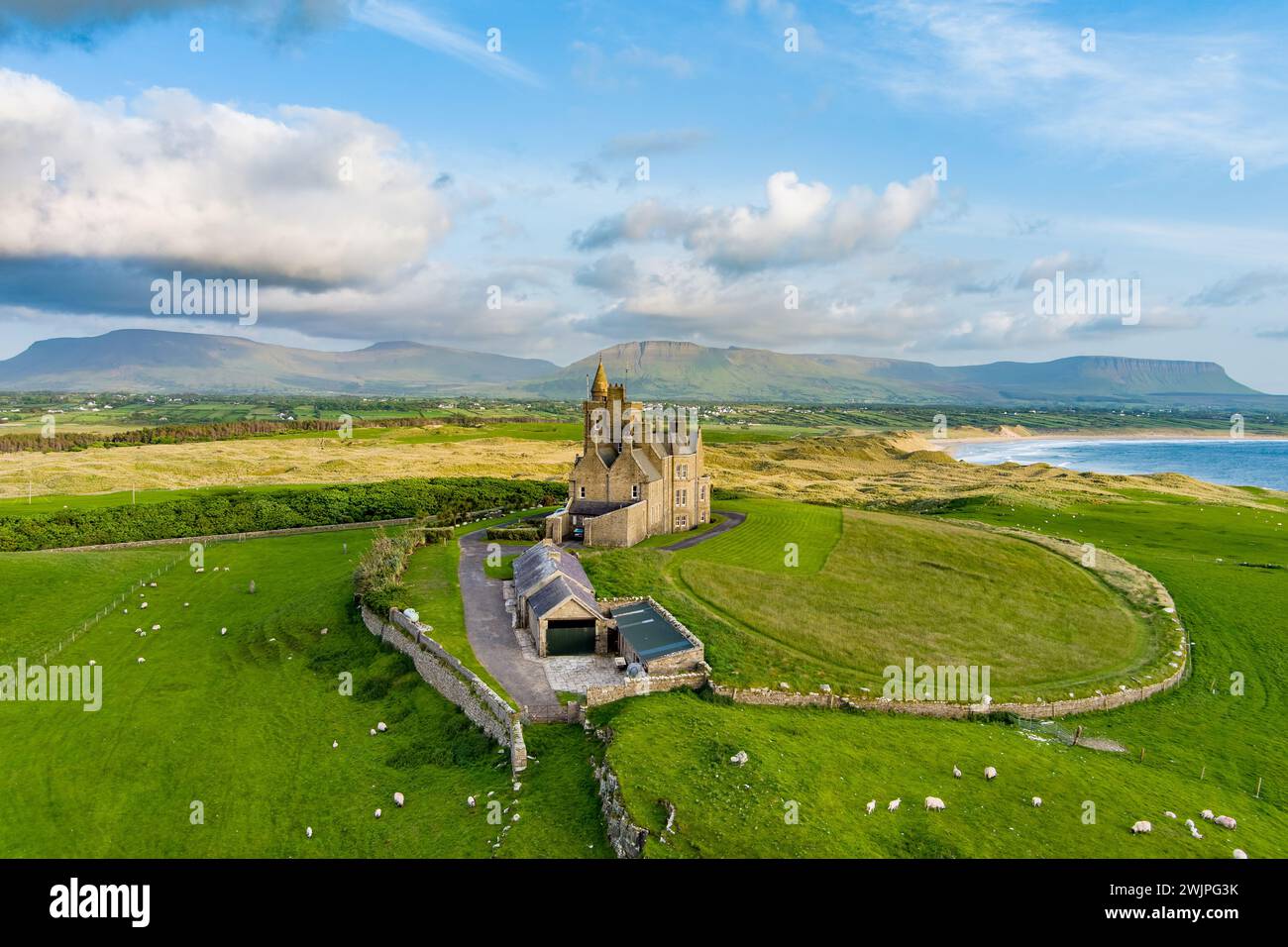 Classiebawn Castle on a backdrop of picturesque landscape of ...