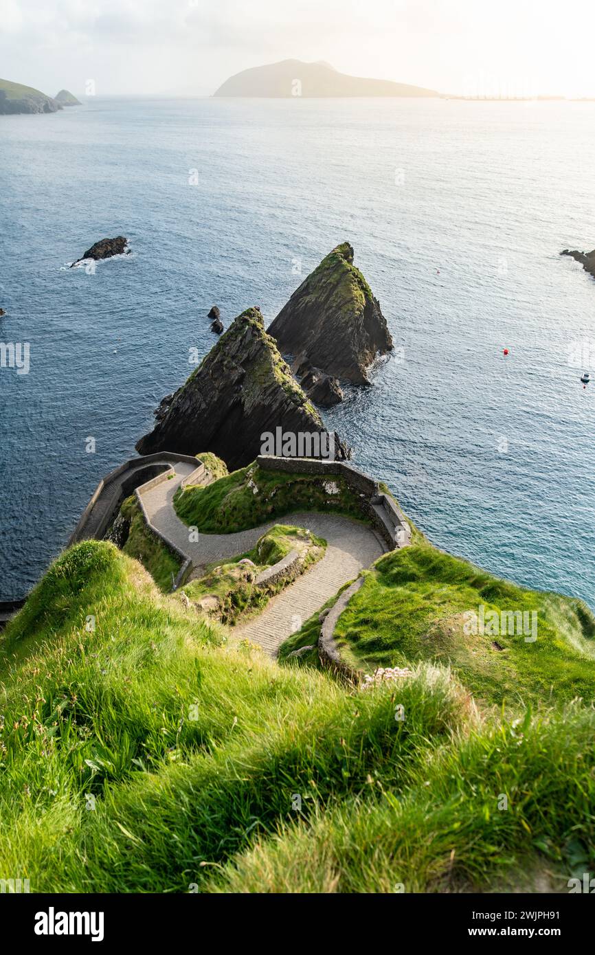 Dunquin or Dun Chaoin pier, Ireland's Sheep Highway. Narrow pathway ...