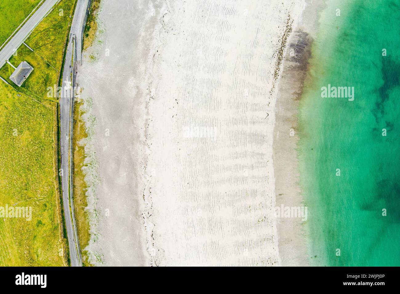 Aerial view of the wide sandy Kilmurvey Beach on Inishmore, the largest ...