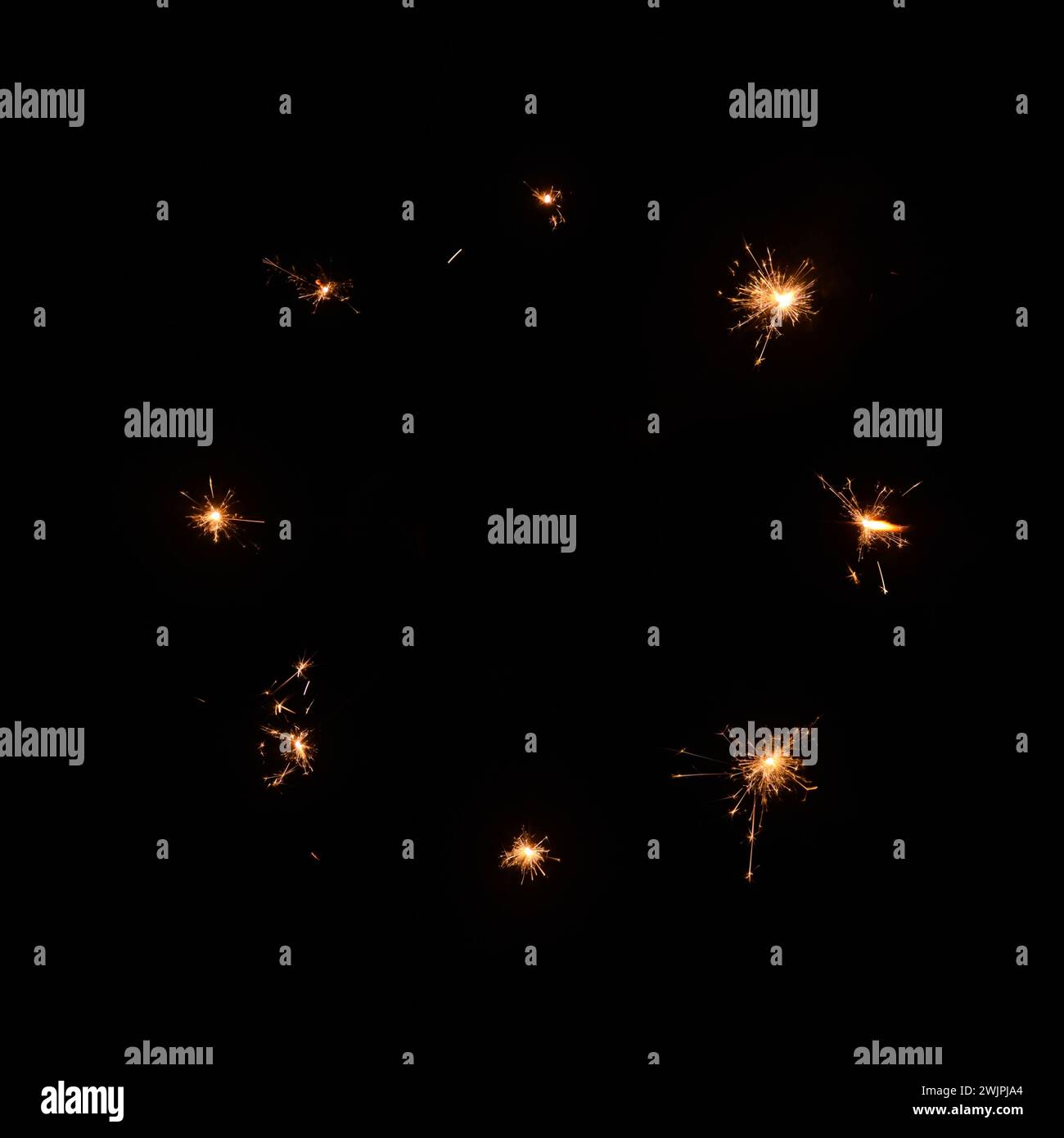 Eight sparklers burning on black background. Perfect overlay of ...