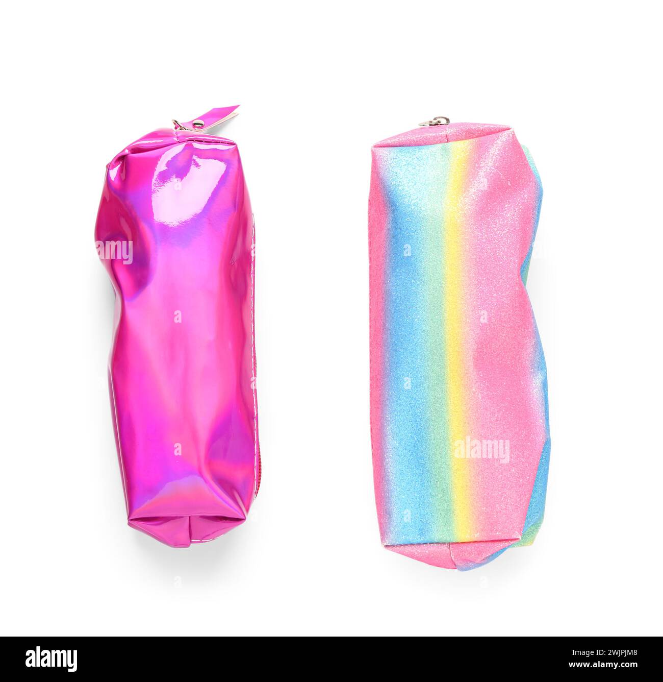 Colorful pencil cases on white background Stock Photo - Alamy