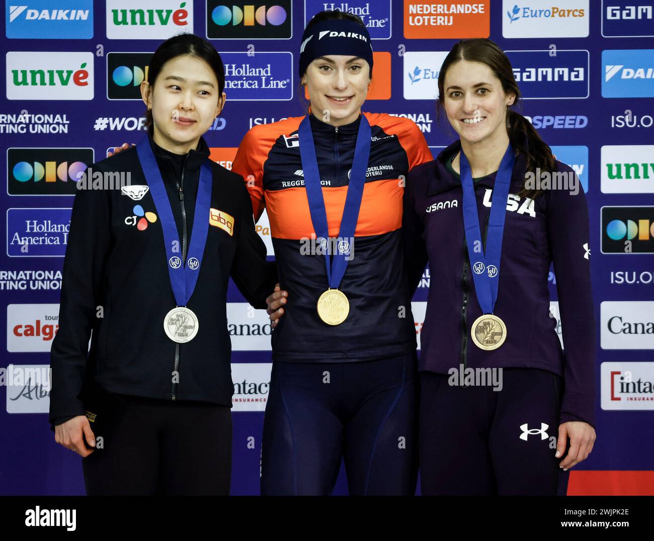 Calgary, Canada. 16th Feb, 2024. Femke Kok, centre, of the Netherlands ...