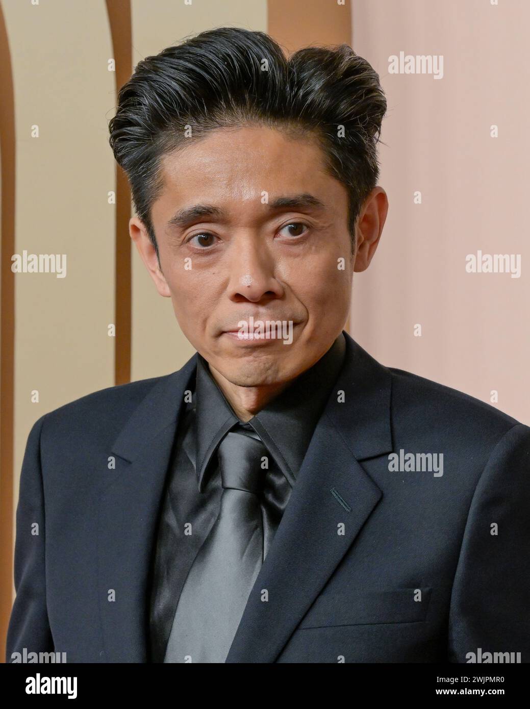 February 12, 2024, Beverly Hills, California, USA: Kazu Hiro attends ...