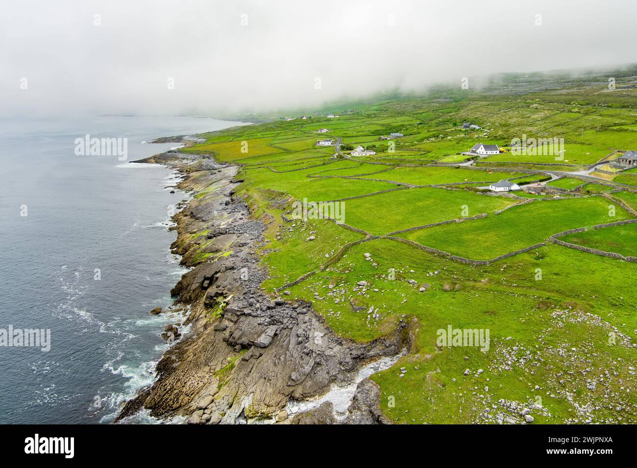 Spectacular misty aerial landscape in the Burren region of County Clare ...