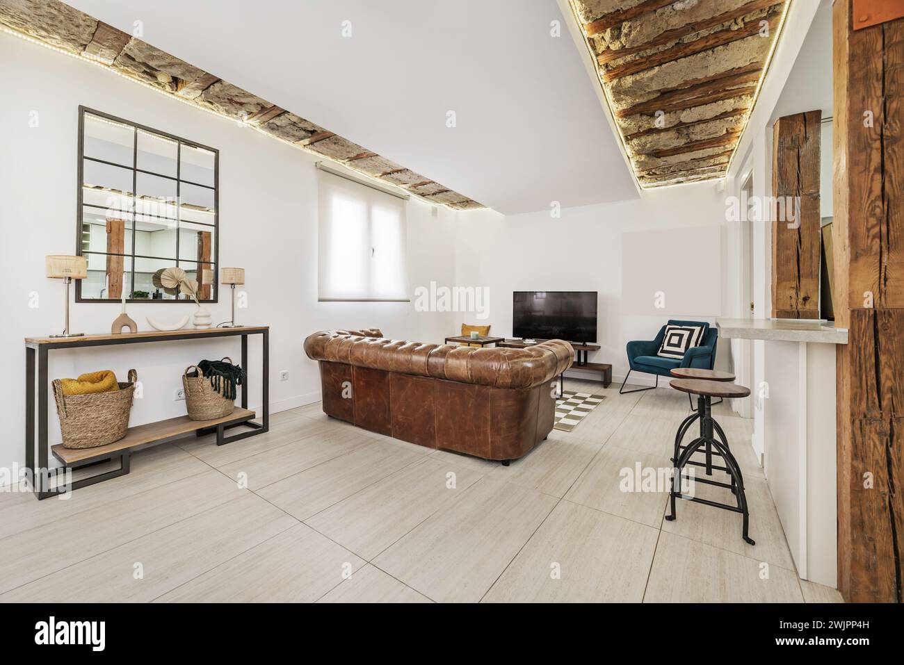 A beautiful loft apartment with contemporary design furniture, an ...