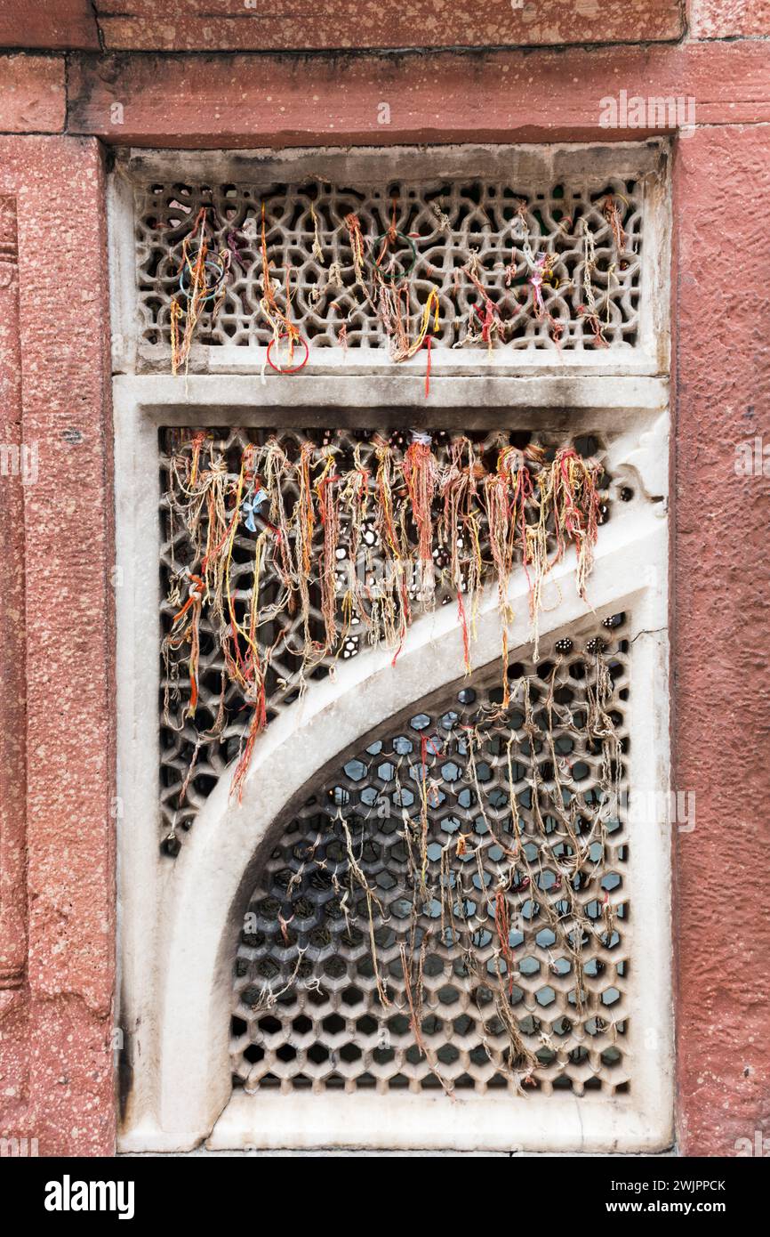 Strings tied to a window outside the Tomb of Salim Chishti, Fatehpur ...
