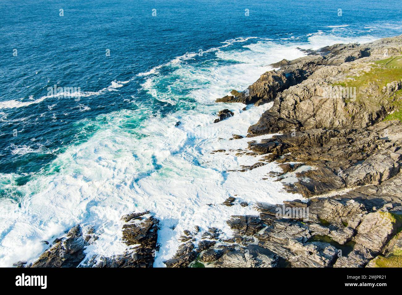 Rough and rocky shore at Malin Head, Ireland's northernmost point, Wild ...