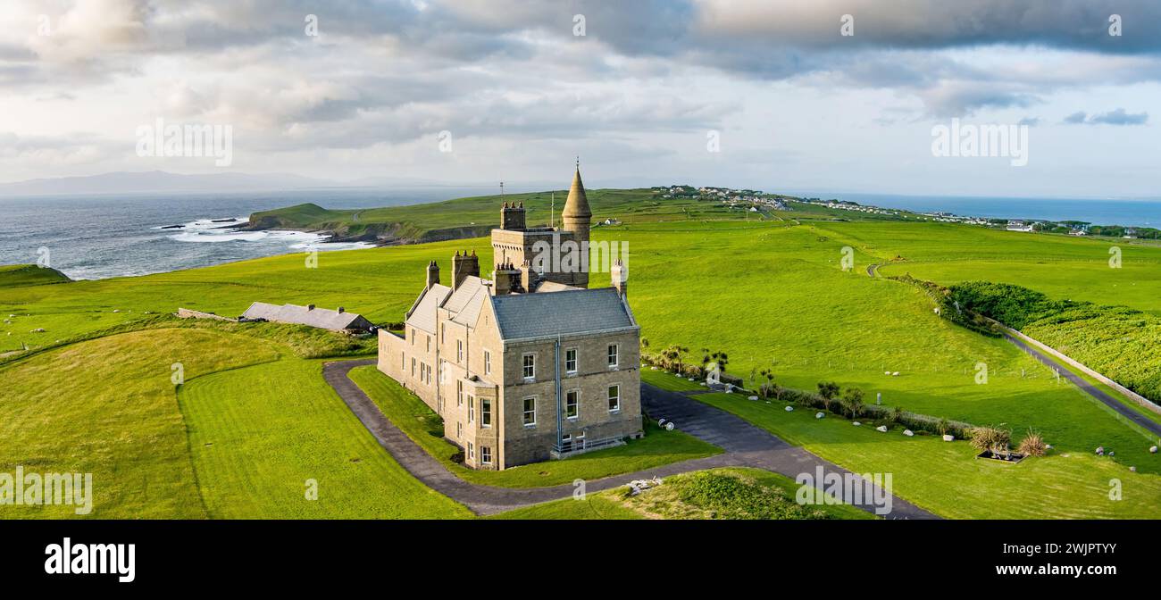Classiebawn Castle on a backdrop of picturesque landscape of ...