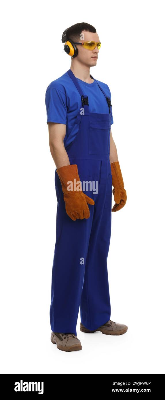 Young man wearing safety equipment on white background Stock Photo - Alamy